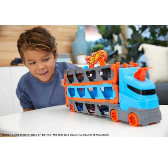 Mattel | Toys | Hot Wheels City Speedway Hauler Gvg37 Transforms Into 6 ...